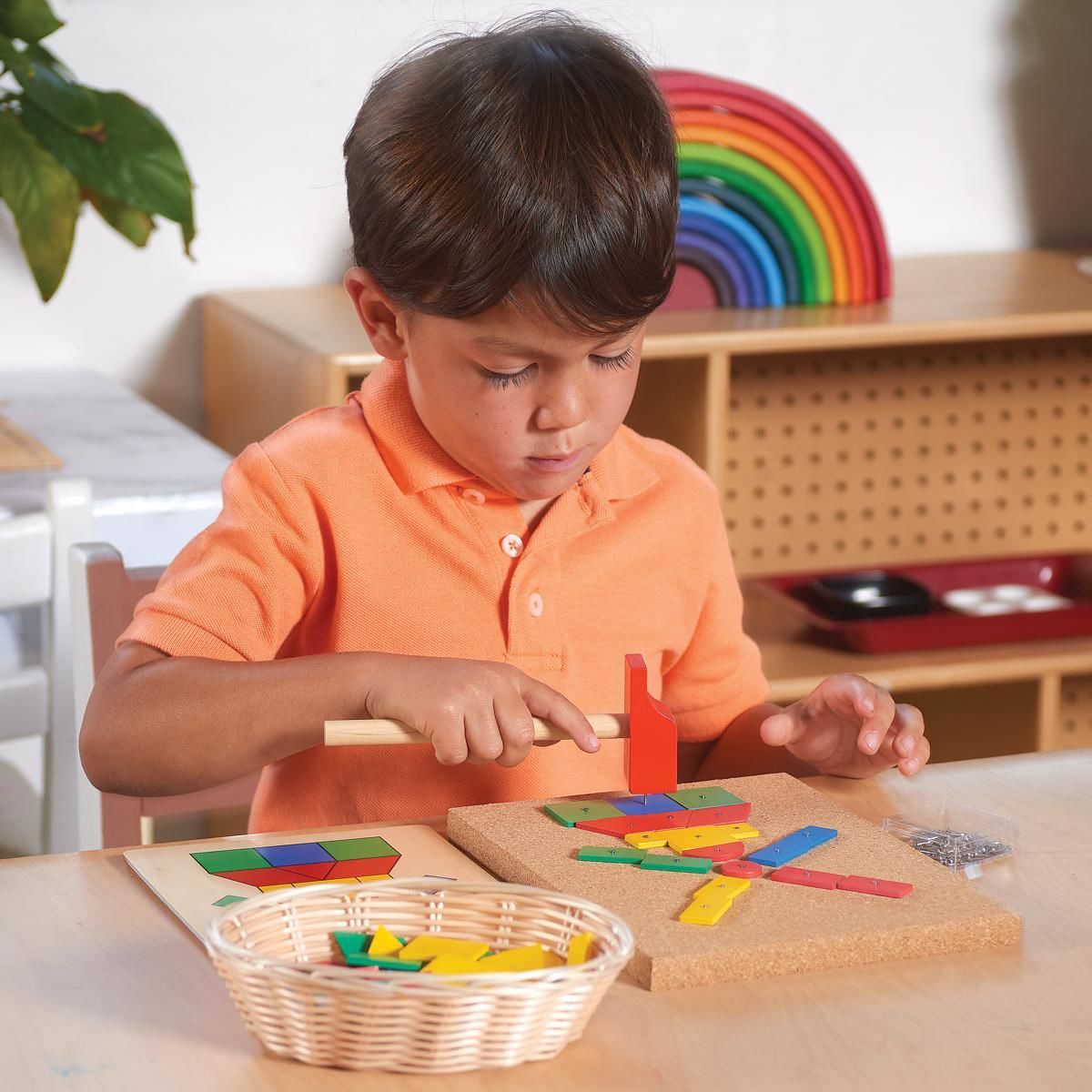 Hammering Shapes - Montessori Services